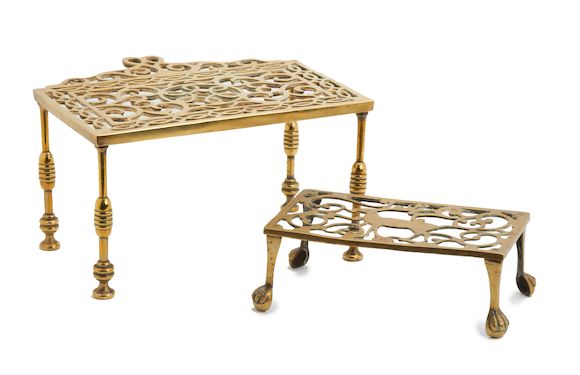 Bonhams : A Regency brass trivet or 'footman', circa 1810