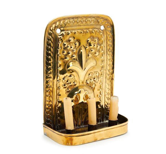 Bonhams : A mid-18th century sheet brass three-light wall sconce, Dutch