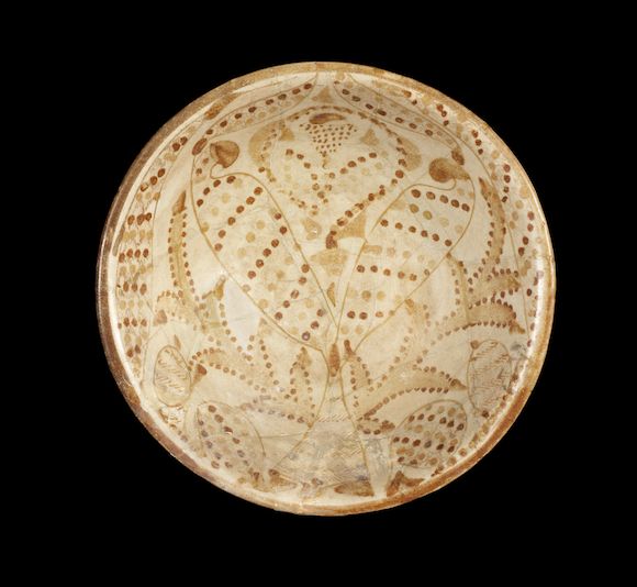 Bonhams : An Abbasid lustre painted pottery Bowl Mesopotamia, 9th Century
