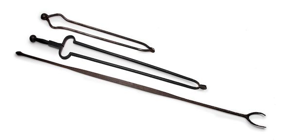 Bonhams : An unusually long wrought iron fire-fork 18th/19th century