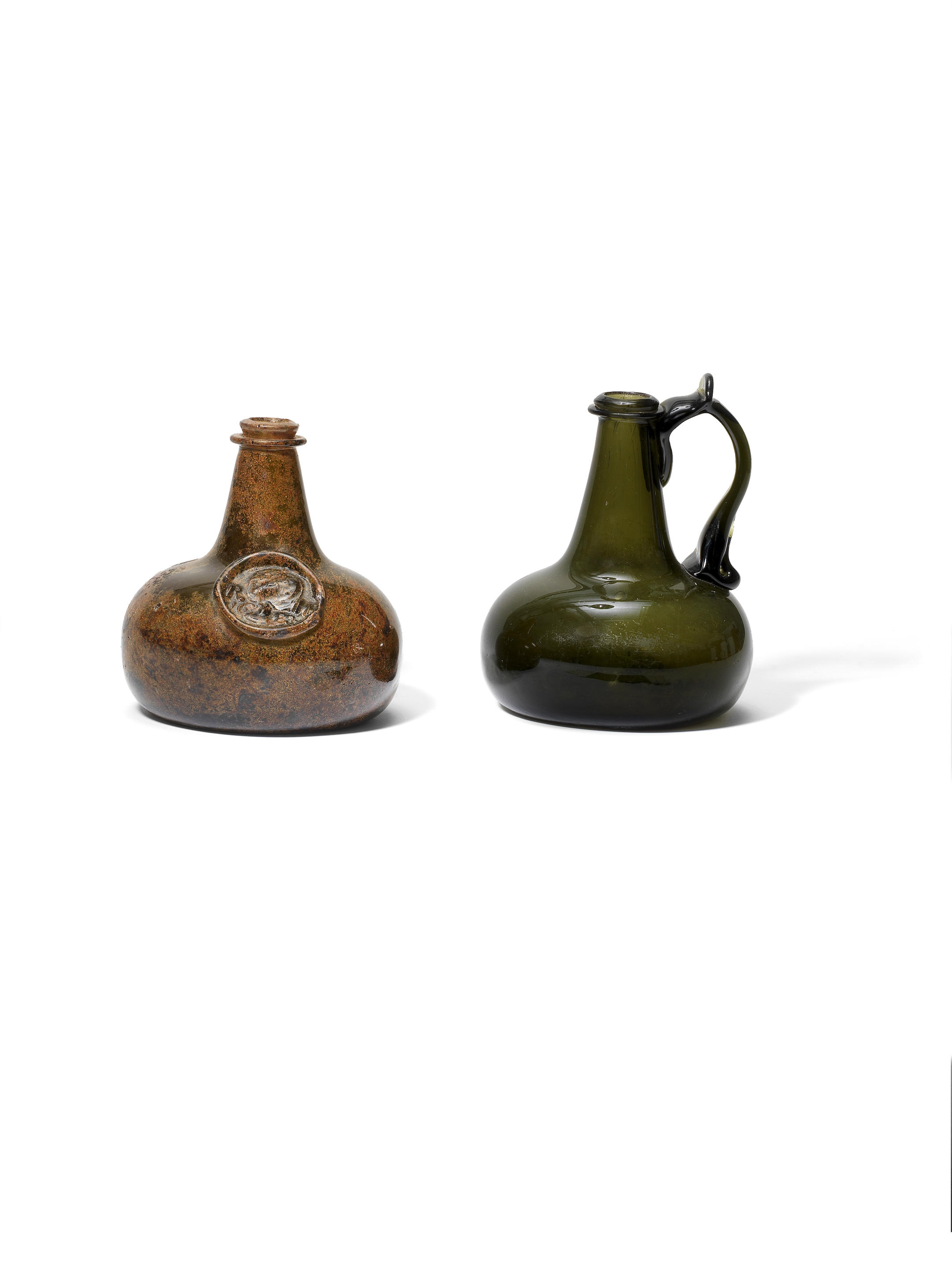 Bonhams A Green Tinted Serving Bottle Circa 1700