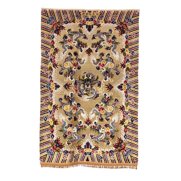 Bonhams : A gold-ground 'nine-dragon' silk carpet Late Qing Dynasty, Wu ...