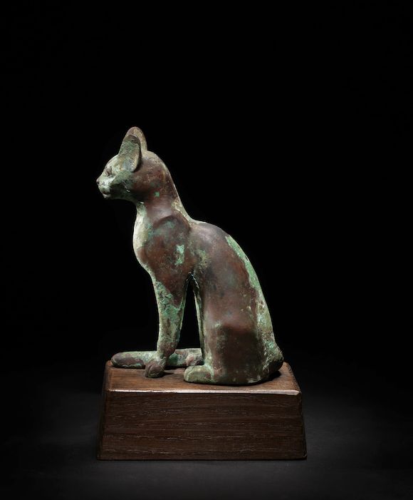 Bonhams : An Egyptian bronze cat
