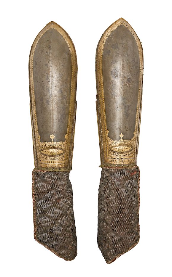 Bonhams : A Pair Of Indian Gold-Damascened Dastana (Arm Guards)