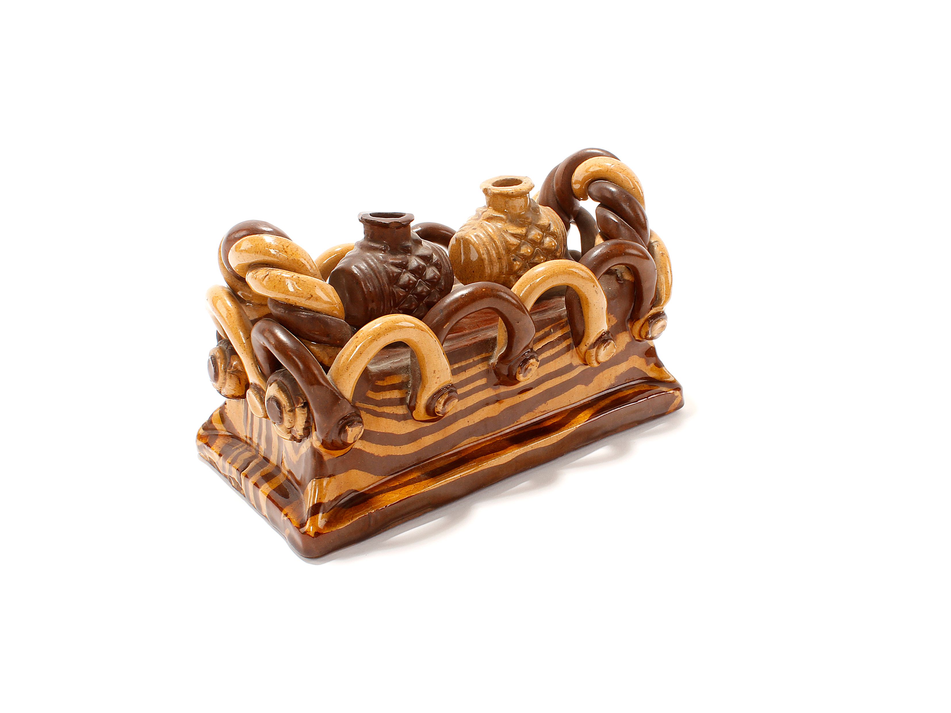 Bonhams : A rare Buckley pottery desk stand