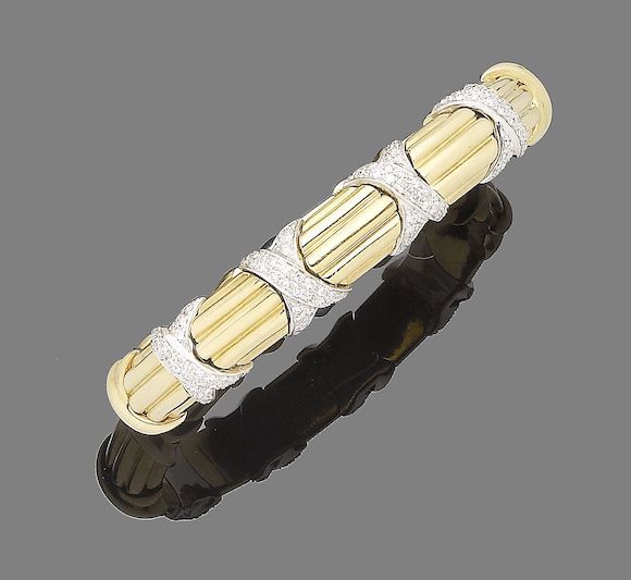 Bonhams : A diamond-set torque bangle