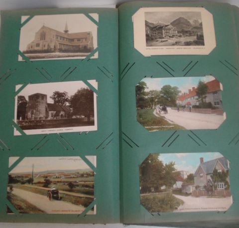 Bonhams : A large postcard album, containing a collection of coloured ...