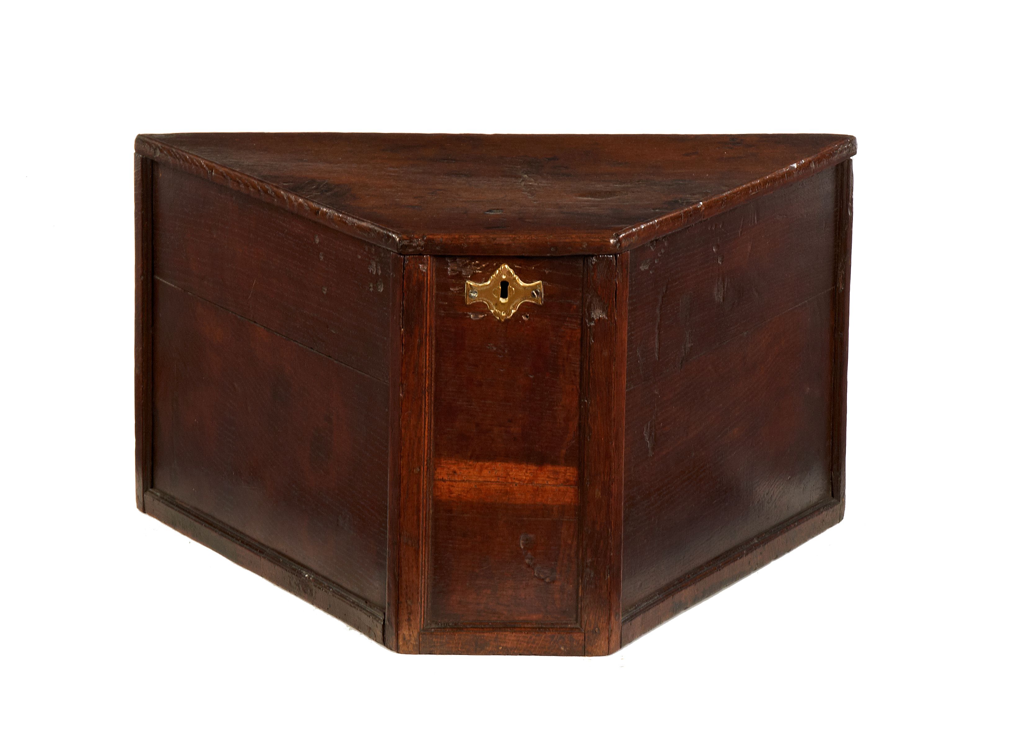 Bonhams : An early 18th century and later oak trapezium-shaped boarded box