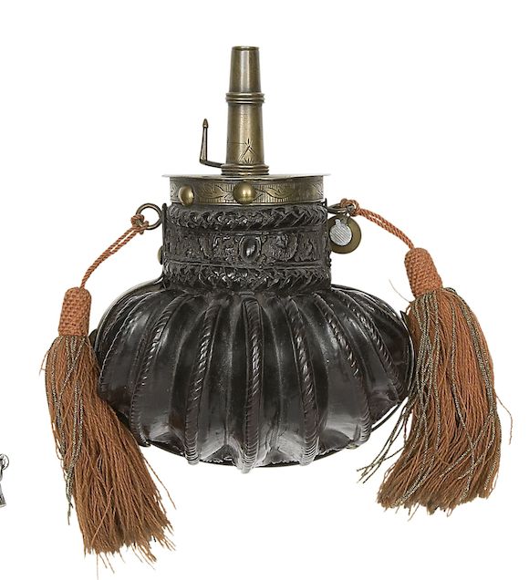 Bonhams : A North Italian Brass-Mounted Cuir-Bouilli Powder-Flask