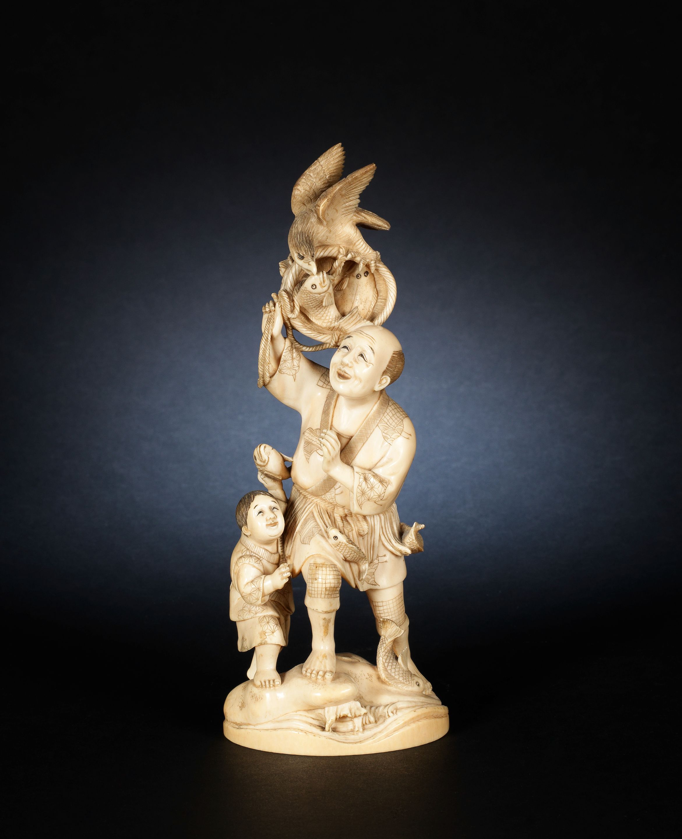 Bonhams : A Japanese stained ivory okimono and four netsuke, Meiji period