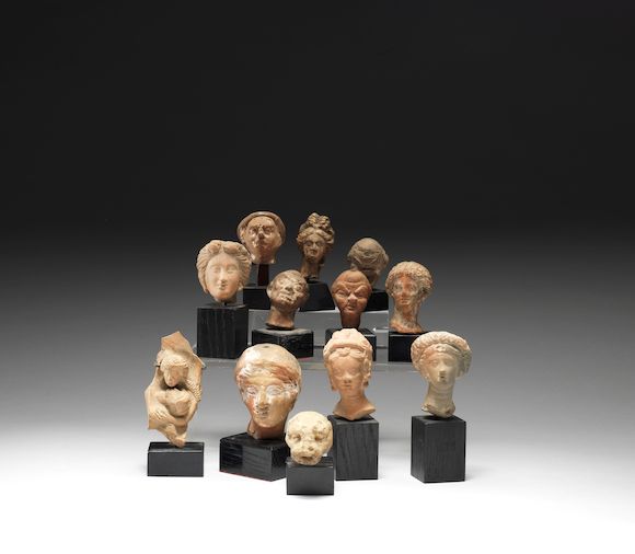 Bonhams : Eleven Hellenistic terracotta heads and a small marble ...