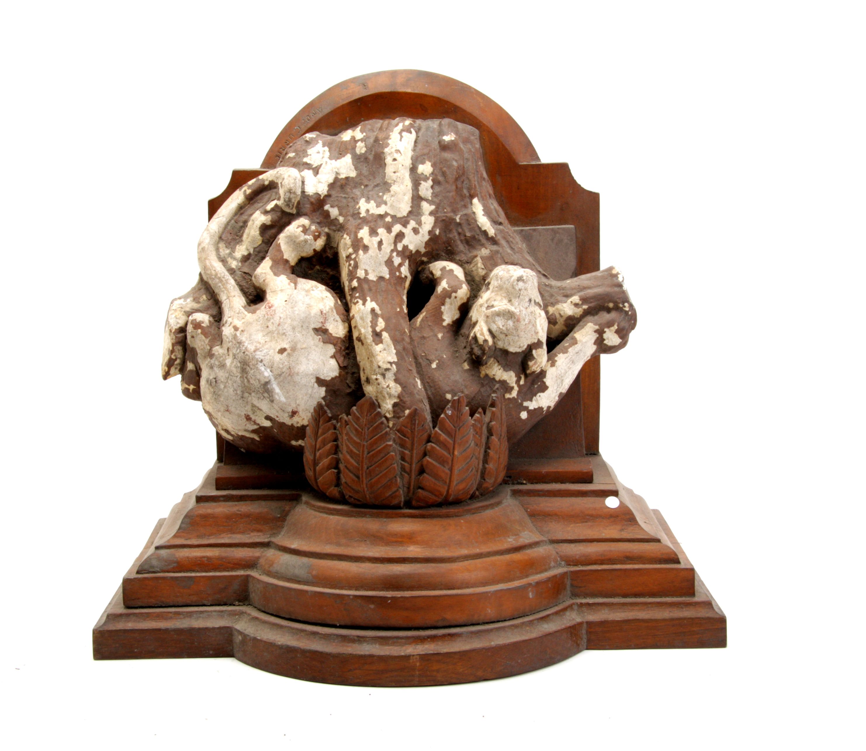 Bonhams : A composition stone cupid capital,