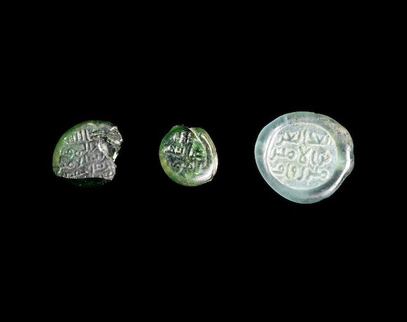 Bonhams : An Abbasid glass vessel Stamp for a ratl of "chickpeas" in ...