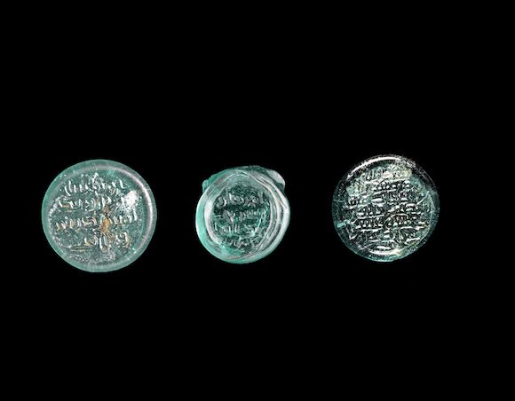 Bonhams : An Umayyad glass half-fals weight of 15 qirat in the name of ...