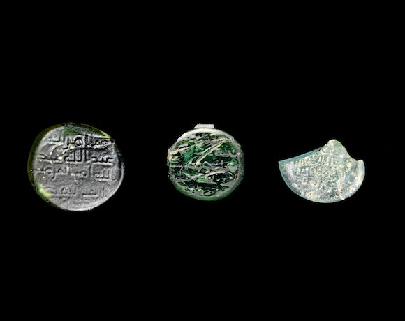 Bonhams : An Abbasid glass vessel Stamp in the name of the Caliph al ...