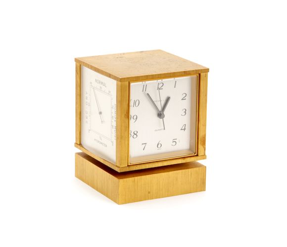Bonhams : A brushed brass rotating desk clock Inscribed Tiffany & Co
