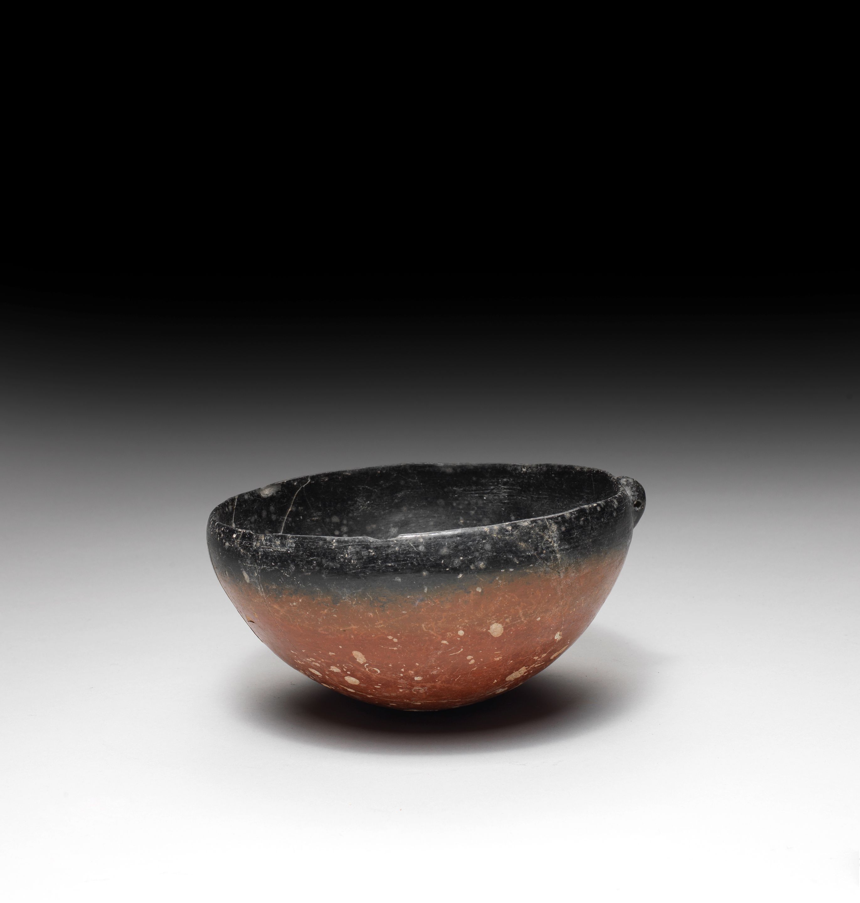 Bonhams : A Cypriot red polished ware bowl