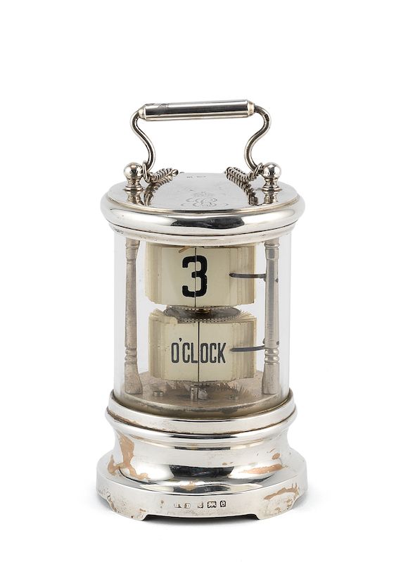 Bonhams : An Edwardian silver-mounted cylindrical cased 'flick clock ...