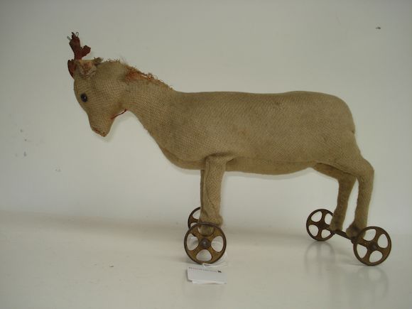 Bonhams : Steiff Reindeer on metal wheels, German circa 1909