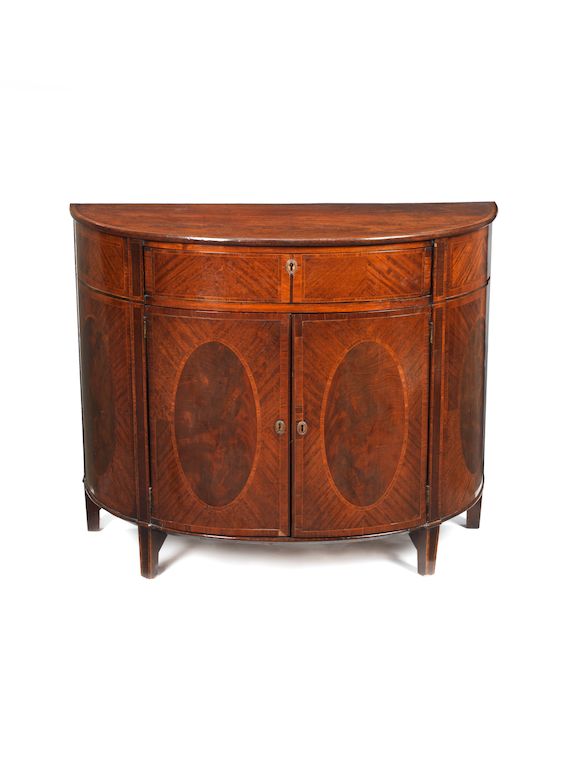 Bonhams : A 19th century demilune commode with crossbanded borders