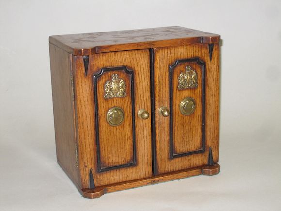Bonhams : A Victorian oak patent novelty tea caddy