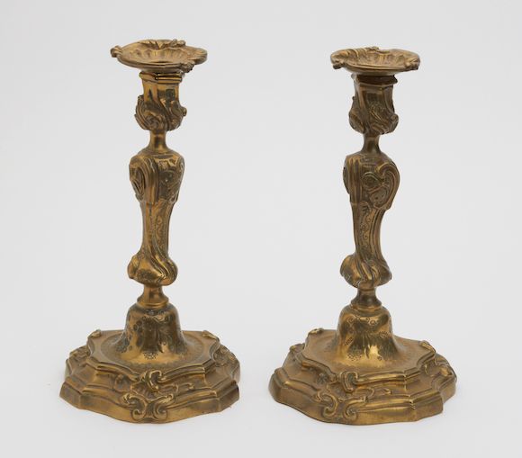 Bonhams : A pair of late 18th/early 19th century French brass candlesticks