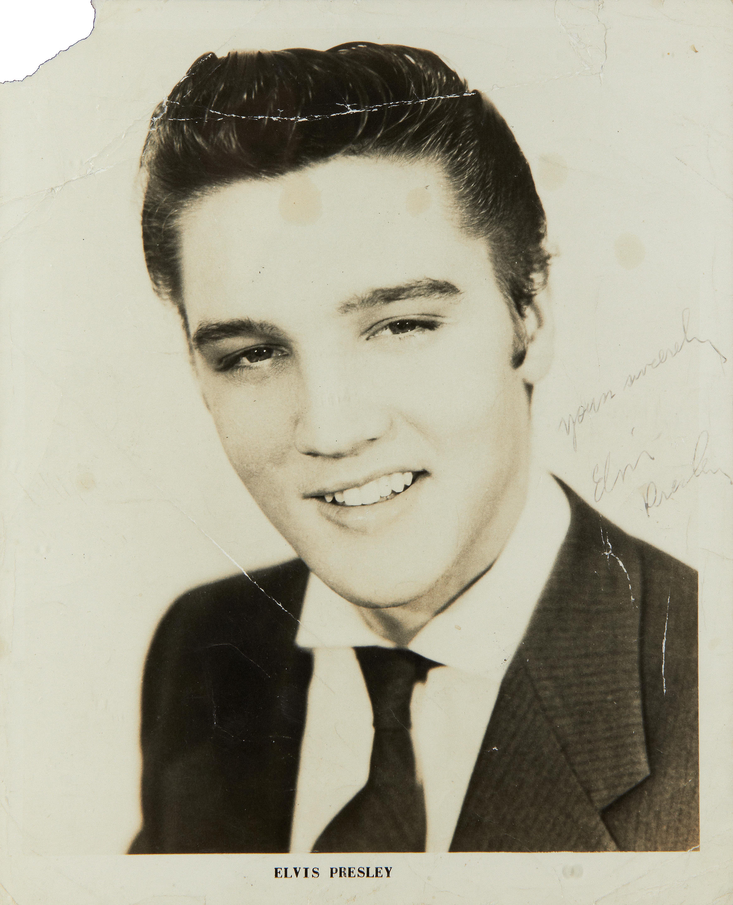 Bonhams : Elvis Presley An autographed photograph, 1950s,