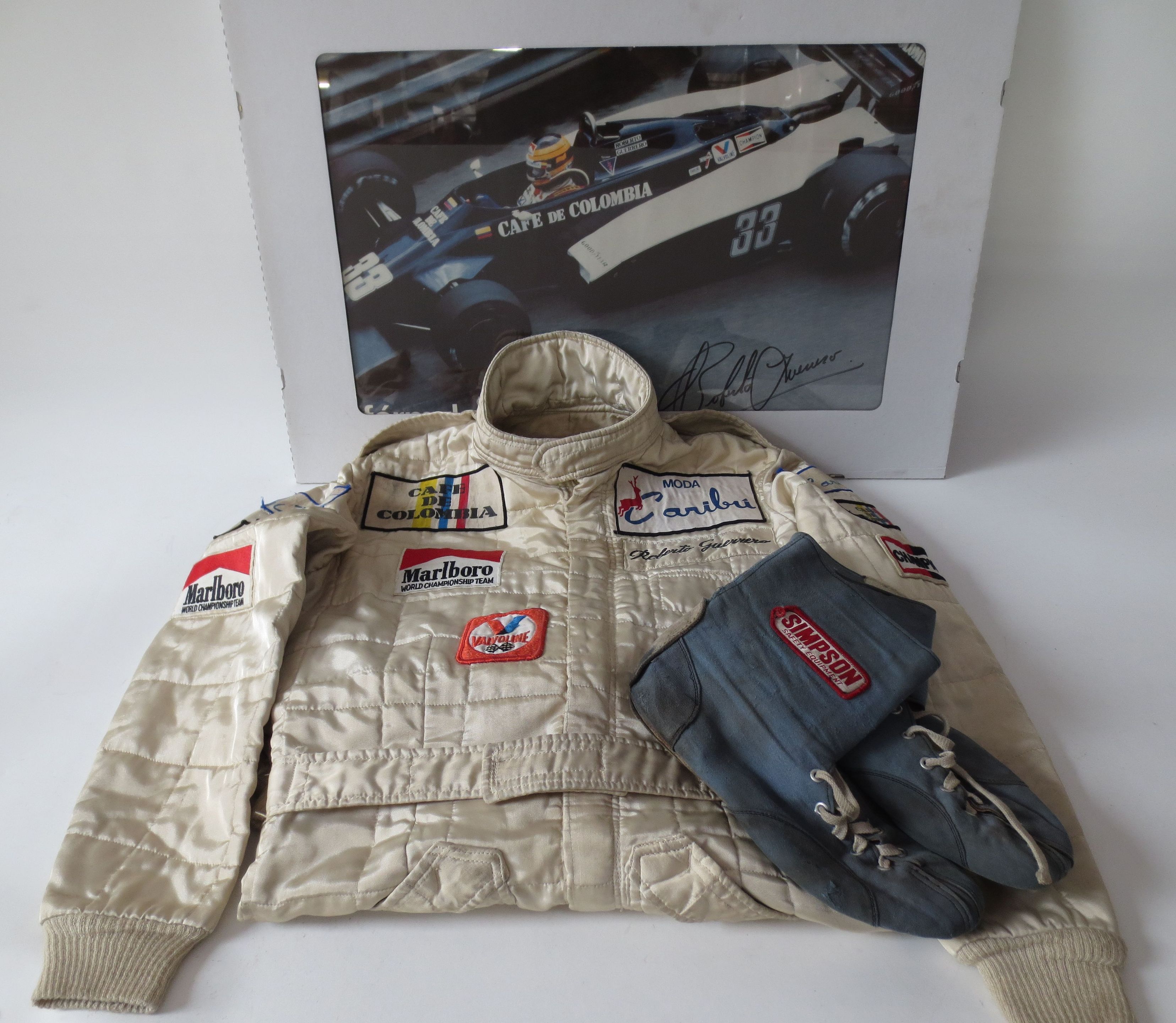 Bonhams Cars : A pair of Roberto Guerrero 'Theodore Racing Team' Formula 1 racing overalls, 1983,