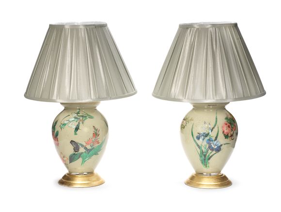 Bonhams : A pair of decalcomania green glass lamp bases with silk shades