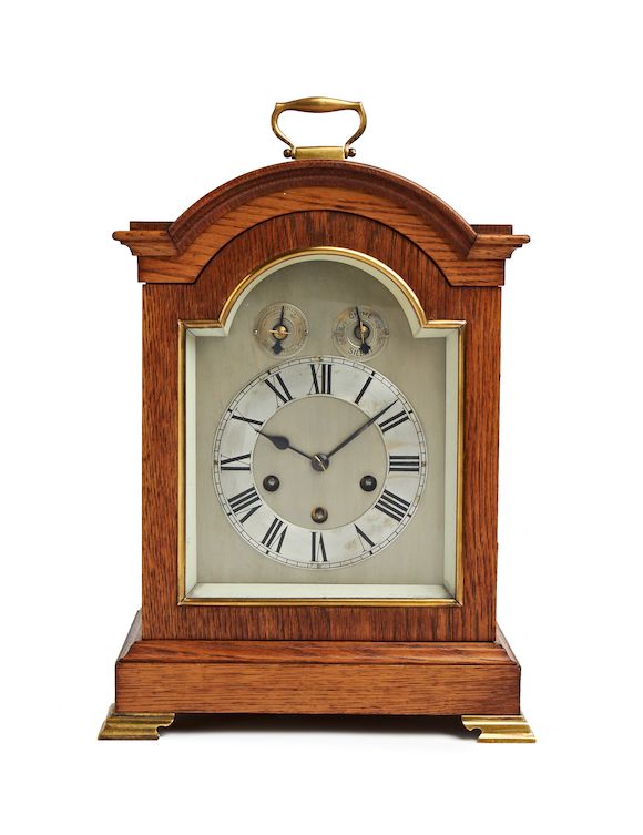 Bonhams : A late 19th century continental oak cased musical mantle ...