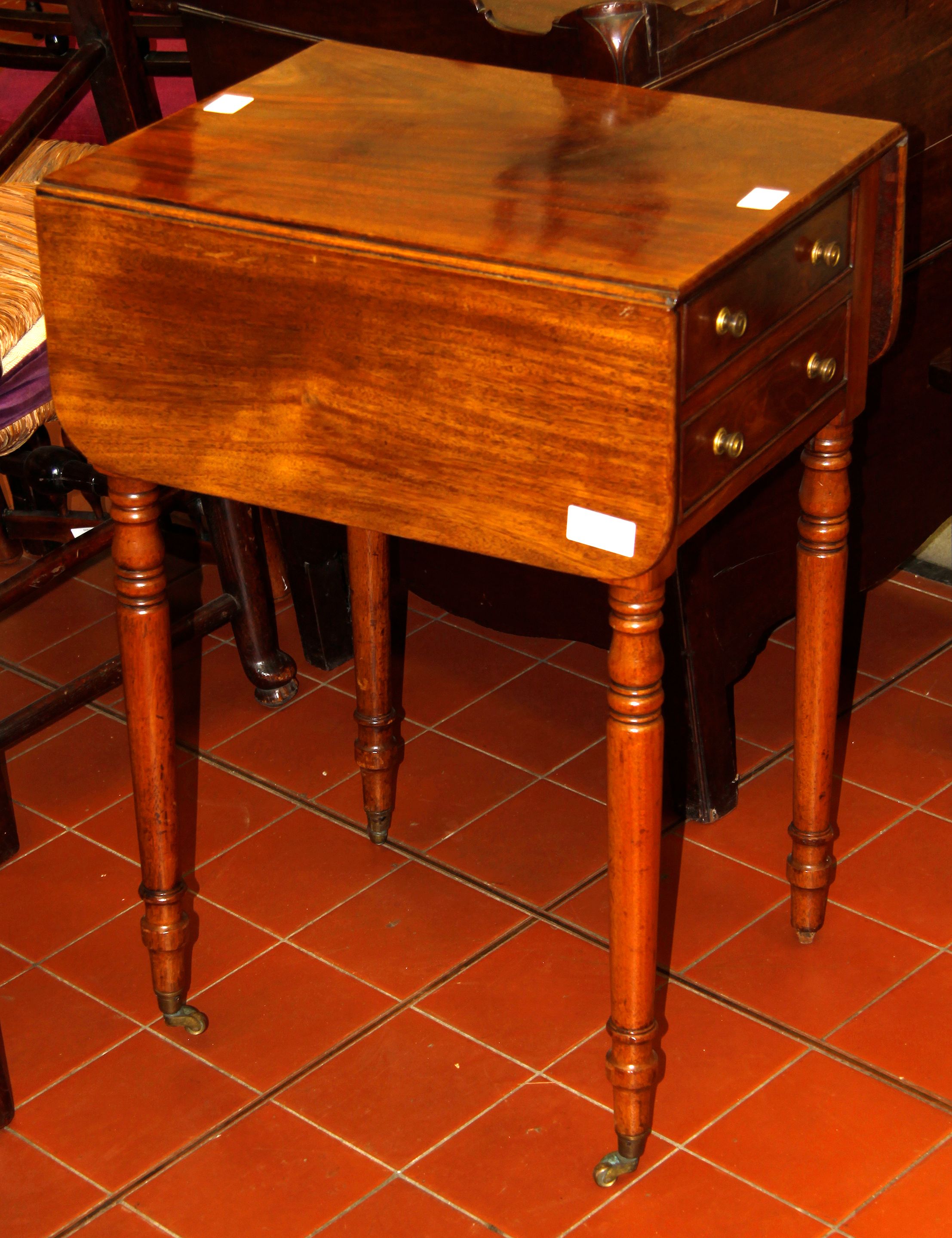 Bonhams : An early 19th Century drop flap work table,