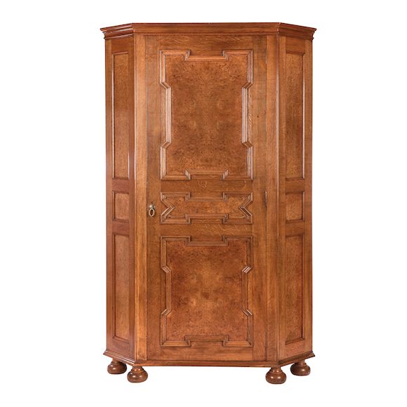 Bonhams : An oak and burr oak corner hall cupboard In the manner of Sir ...