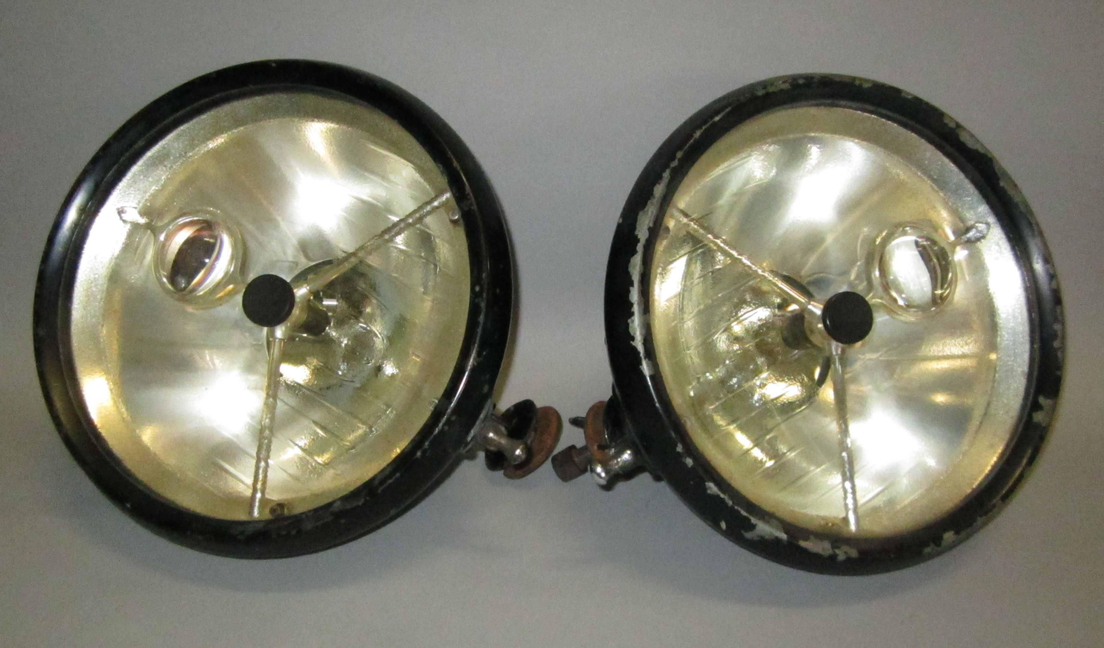 Bonhams Cars : A pair of DB100 'bulls-eye' electric headlamps, British,