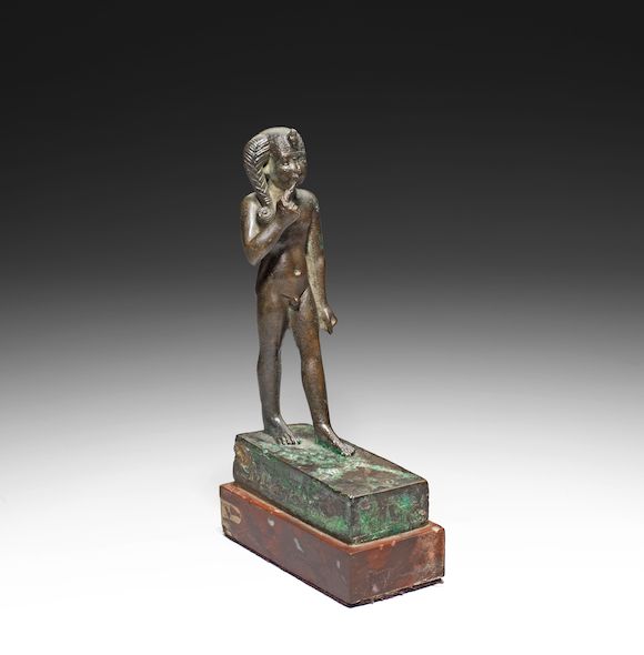 Bonhams : An Egyptian bronze figure of Harpocrates