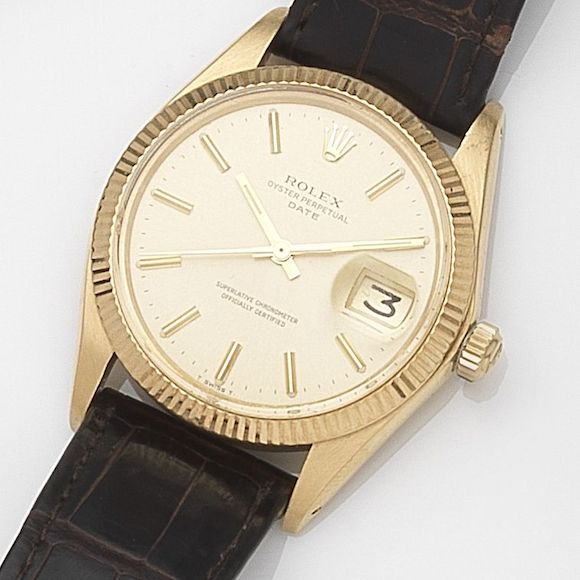 Bonhams : Rolex. An 18ct gold automatic calendar wristwatchDate ...