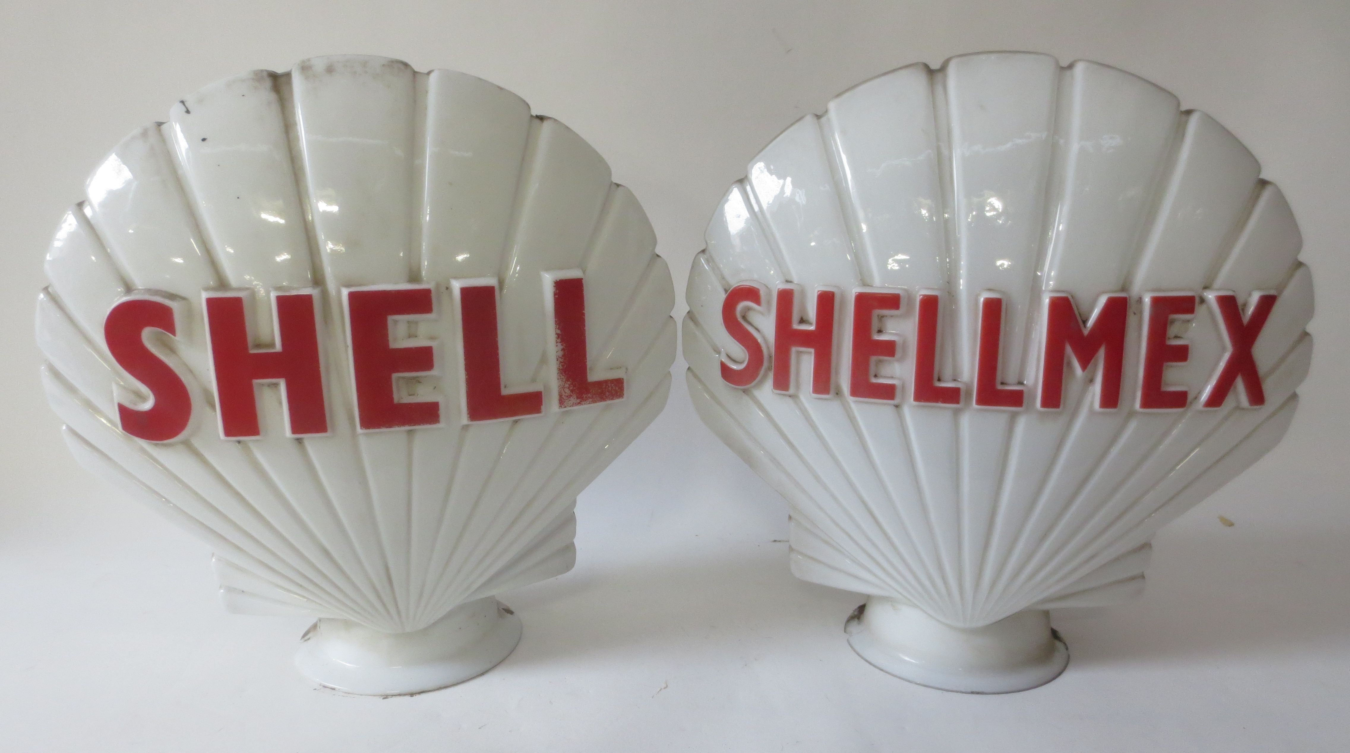 Bonhams Cars : Two glass petrol pump globes for Shell and Shellmex,