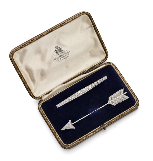 Bonhams : An early 20th century diamond bar brooch and sûreté pin set