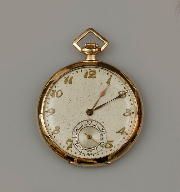 Bonhams : An 18ct gold open faced keyless wind slim pocket watch