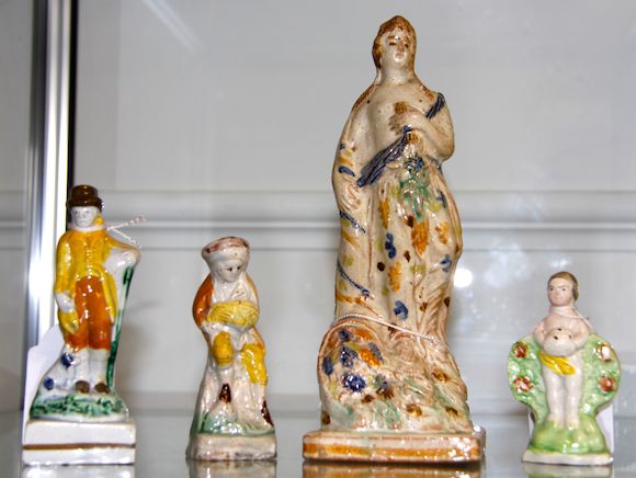 Bonhams : Four Staffordshire pearlware and salt glazed figures
