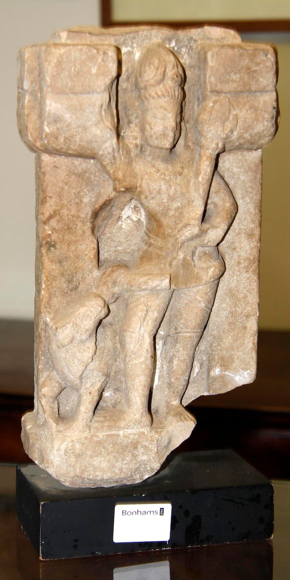 Bonhams : An Indian sandstone fragmentary relief carving