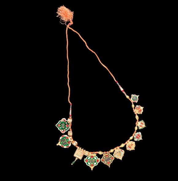 Bonhams : An enamelled gold Footprint of Vishnu (Vishnupada) Necklace ...