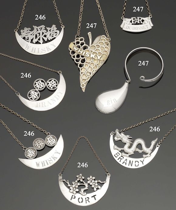 Bonhams : Five Chinese silver wine labels by Wang Hing (5)