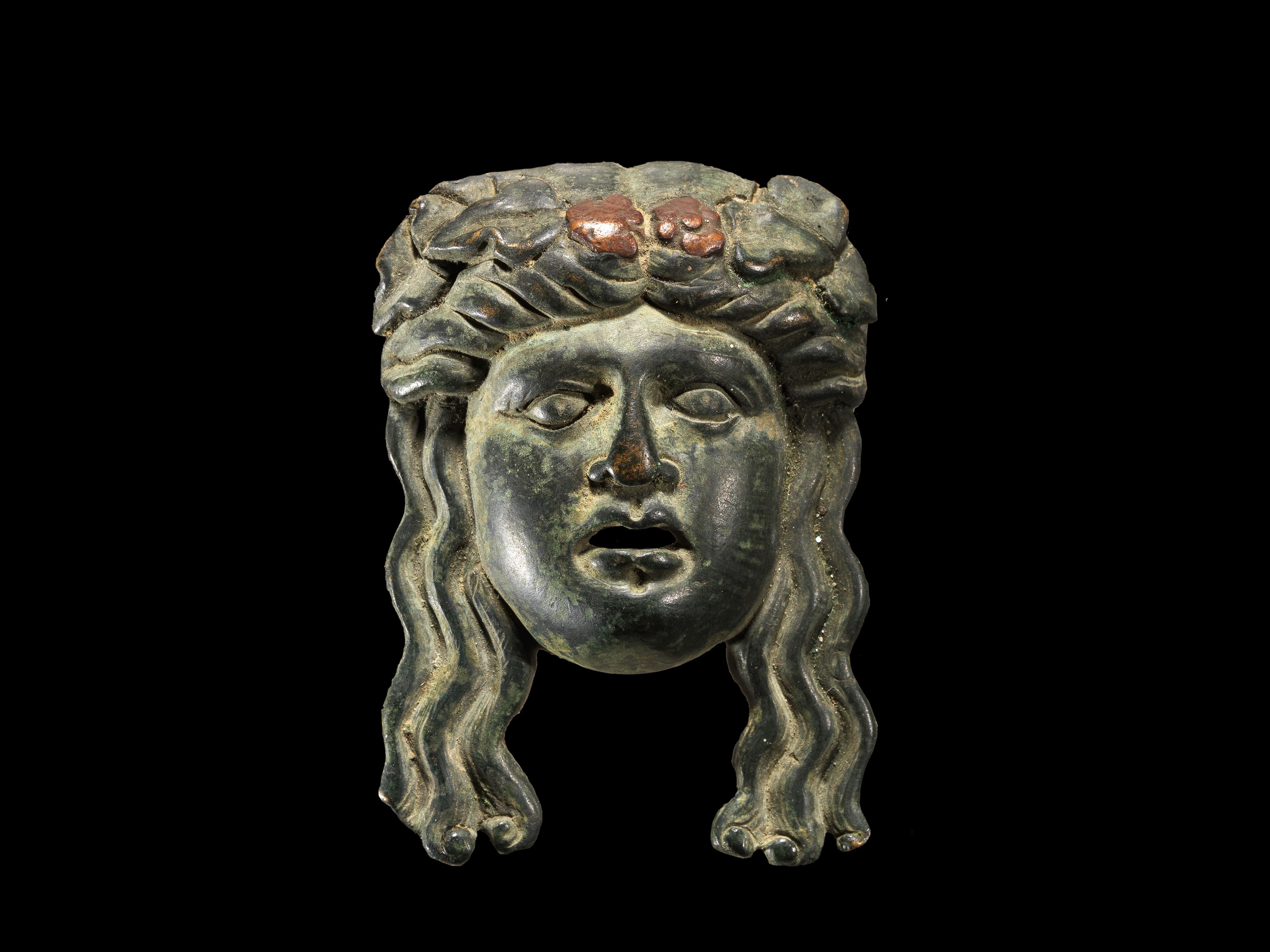 Bonhams : A Roman bronze Bacchic mask