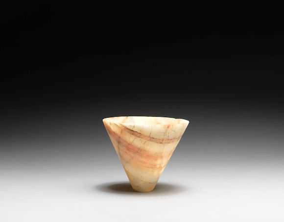 Bonhams : A Mesopotamian banded calcite vessel