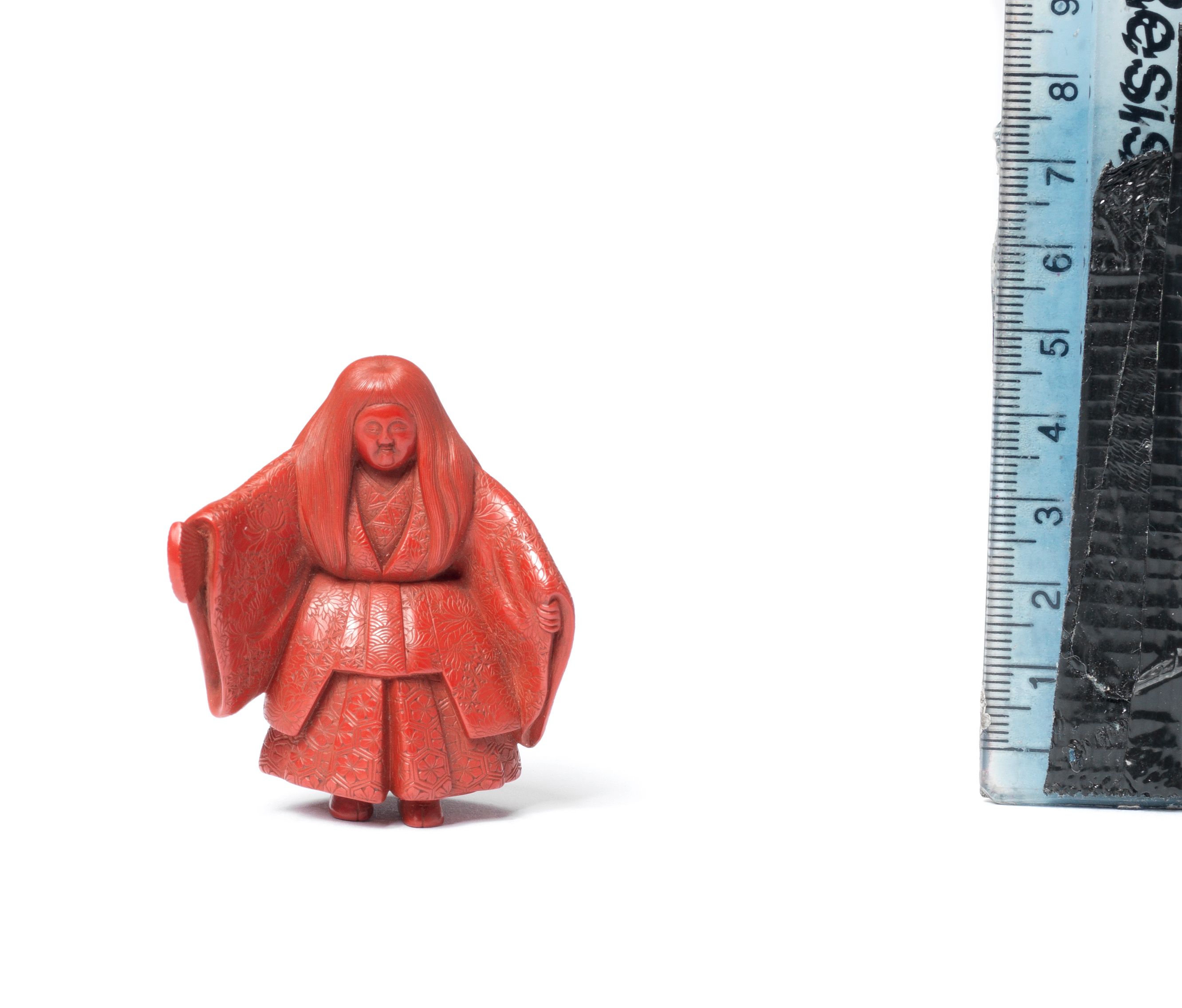Bonhams : A tsuishu (carved red-lacquer) netsuke of a shojo dancer By ...