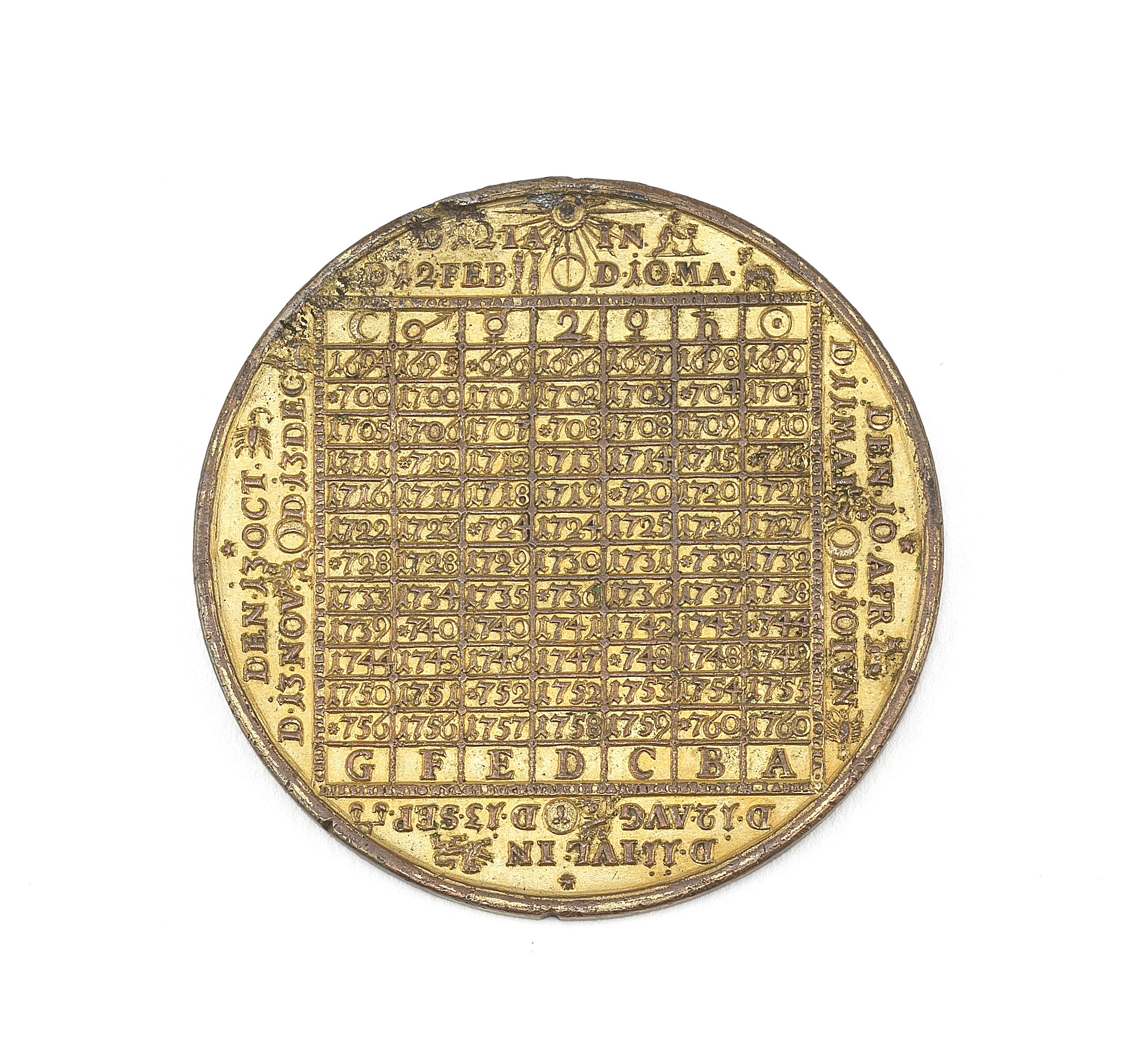 Bonhams : A gilt bronze calendar disc, German, dated 1694,