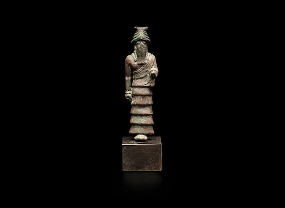Bonhams : A Sumerian bronze figure of a deity