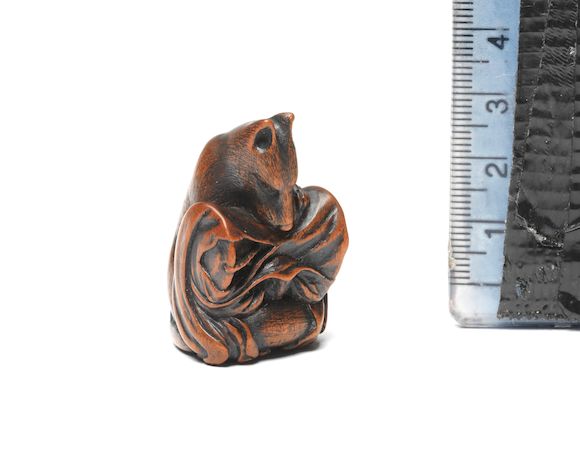 Bonhams : A wood netsuke of Tadanobu transformed into a fox By Ittan ...