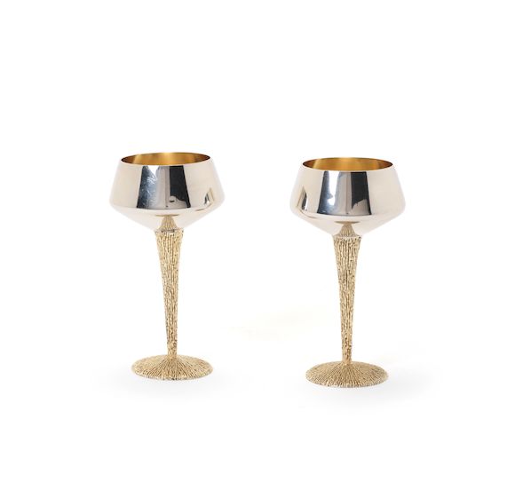 Bonhams : STUART DEVLIN: A pair of silver and silver-gilt goblets ...