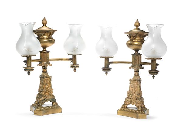 Bonhams : A pair of Regency gilt bronze colza lamps